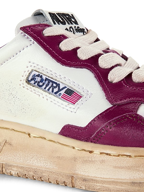 Shop Autry Super Vintage Low-Top Leather Sneakers | Saks Shop Autry Super Vintage Low-Top Leather Sneakers | Saks