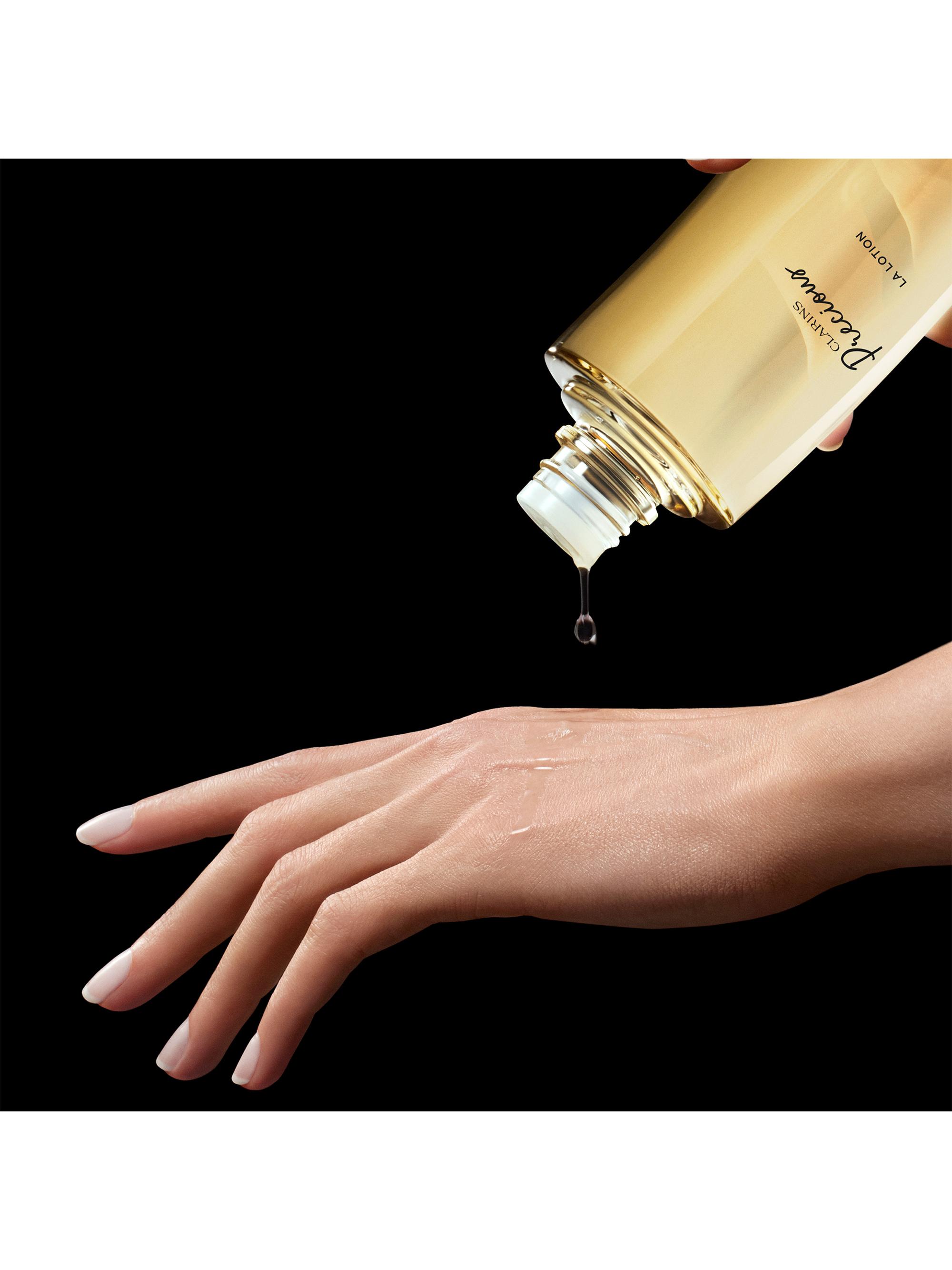 Clarins Precious La Lotion Age-Defying Treatment Essence | Saks Fifth ...