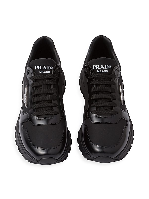 Shop Prada Prada Re-Nylon and Brushed Leather Sneakers Shop Prada Prada Re-Nylon and Brushed Leather Sneakers
