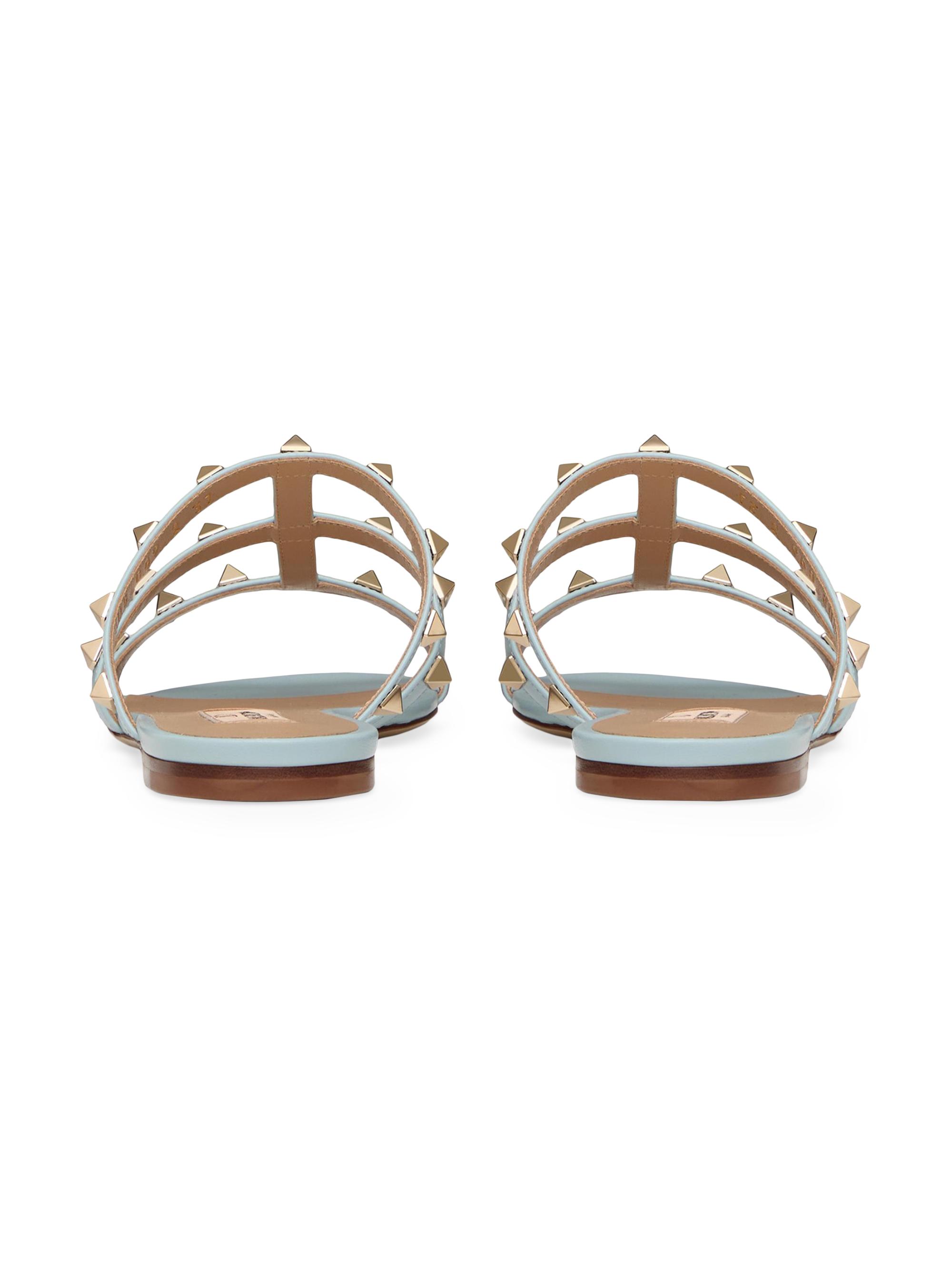 Valentino Garavani Rockstud Flat Slide Sandals | Saks Fifth Avenue