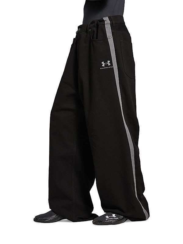Shop Balenciaga Under Armour Tracksuit Denim Pants | Saks Shop Balenciaga Under Armour Tracksuit Denim Pants | Saks