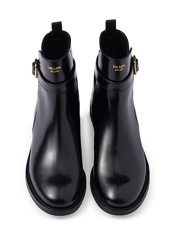 Shop Prada Brushed Leather Ankle Boots with Strap | Saks Shop Prada Brushed Leather Ankle Boots with Strap | Saks